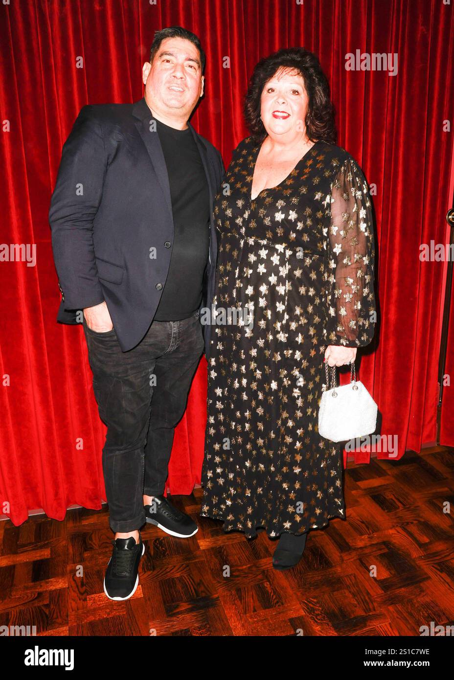 Scot Mochan and Karen Chamberlain attend the Alan Enfield Christmas ...