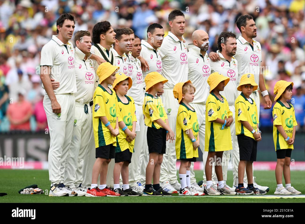 Australia team sings their national anthem during day one of the fifth ...