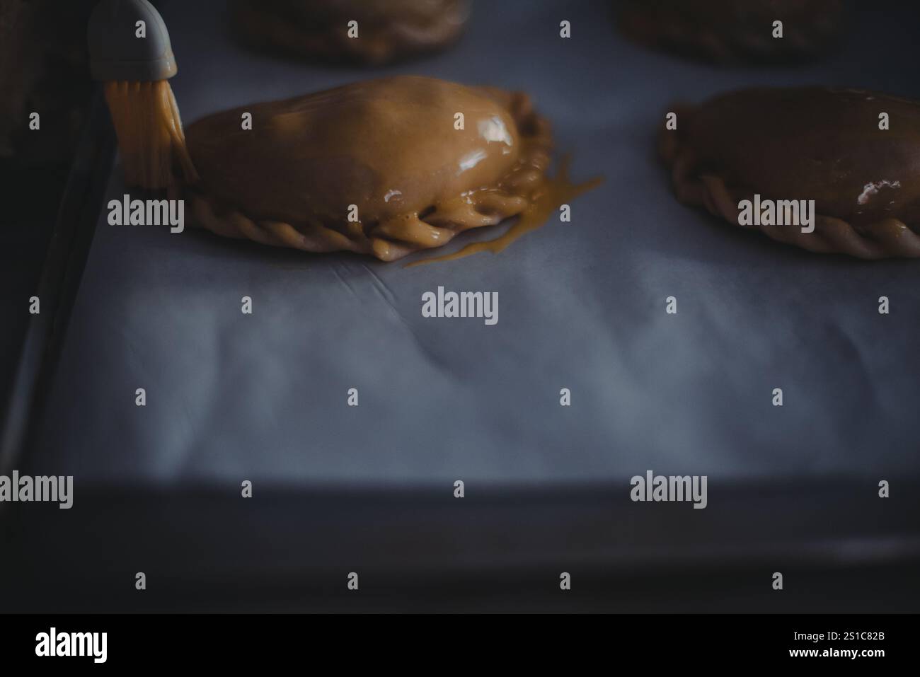empanadas being made in a kitchen, details of pastry and kitchen ...