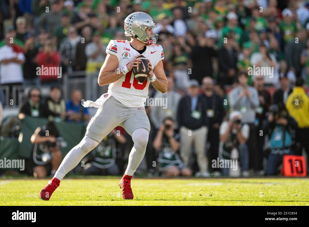 Ohio State Buckeyes quarterback Will Howard (18) drops back to pass during the College Football ...