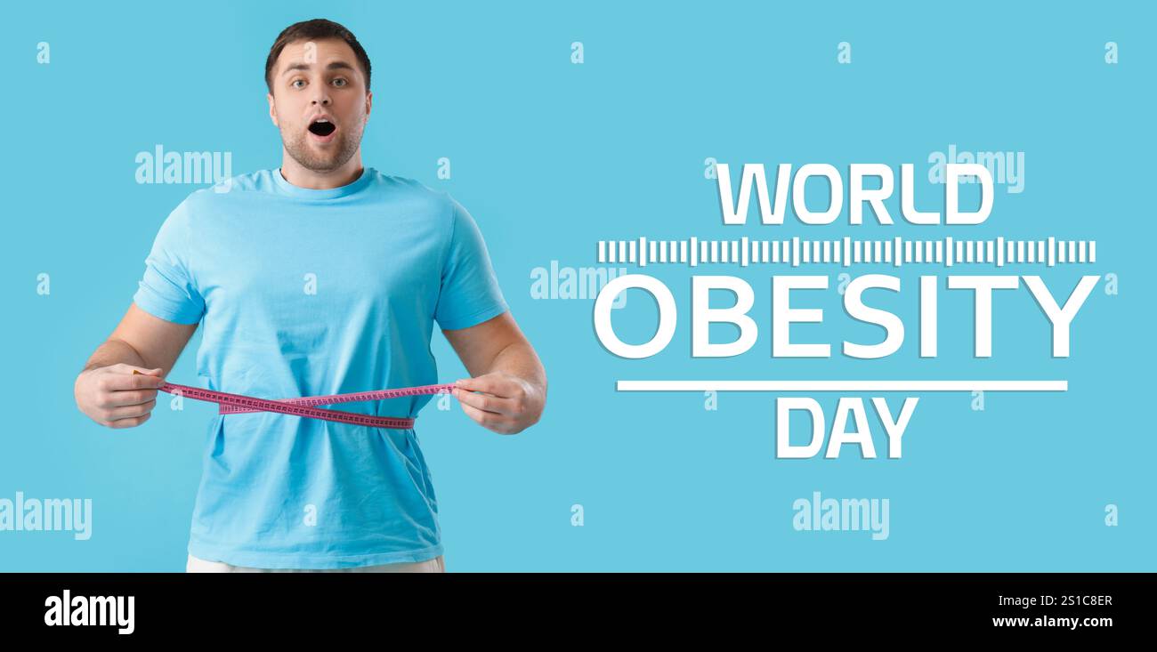 Shocked young man measuring his waist on light blue background. Banner ...