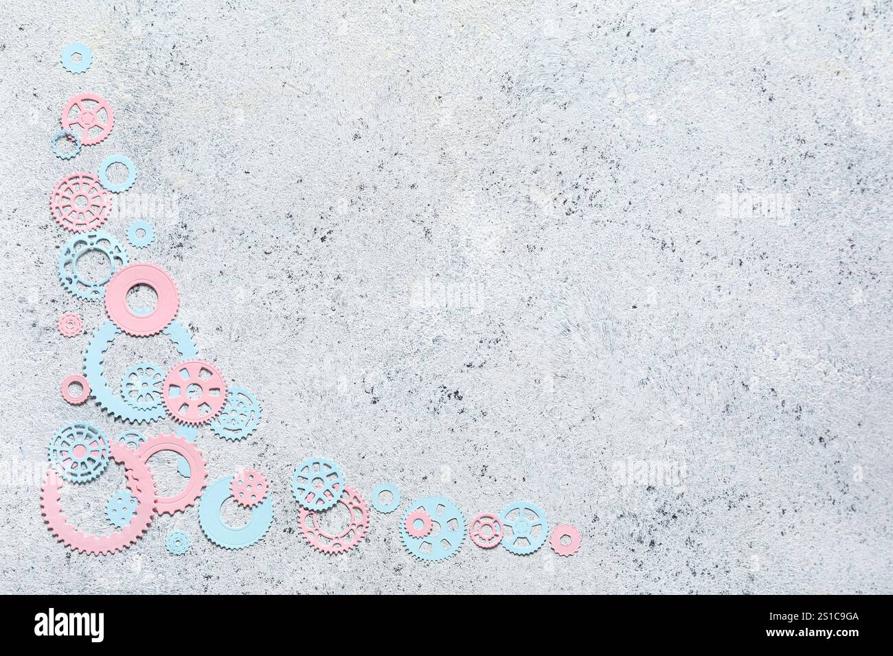 Different paper gears on white background Stock Photo - Alamy