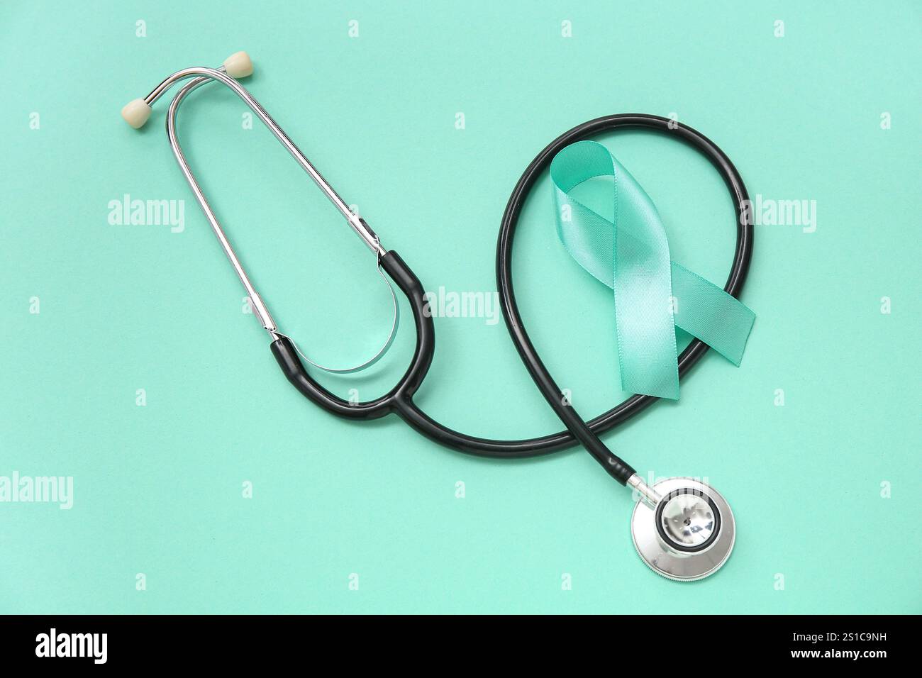 Turquoise ribbon with stethoscope on color background. Cervical Health ...