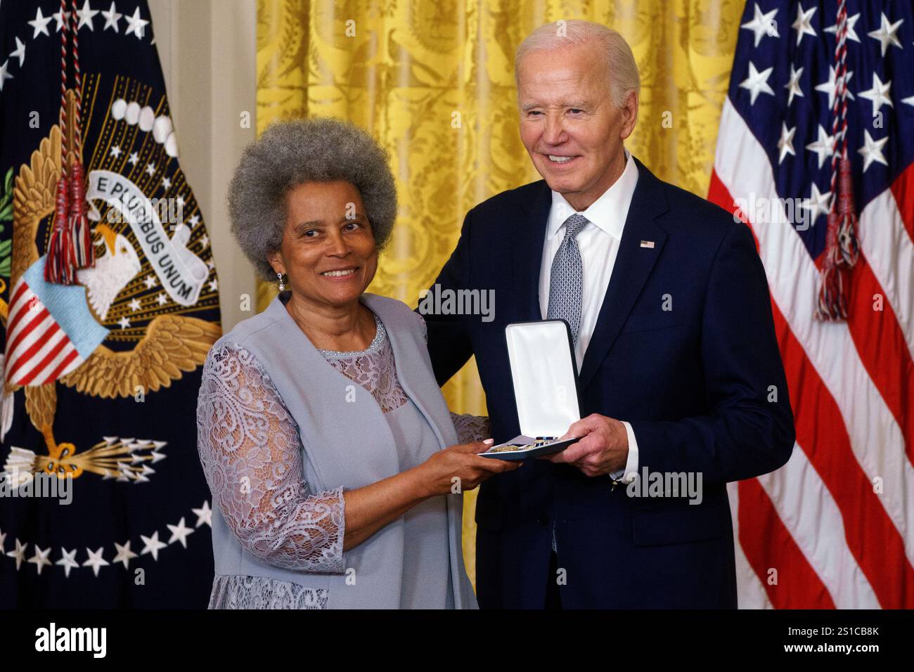 US President Joe Biden presents the Presidential Citizens Medal Rupa ...