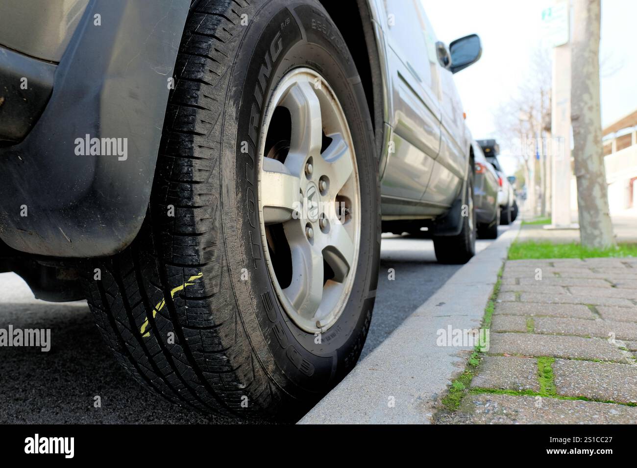 Tire chalking, parking enforcement technique where an officer marks a ...