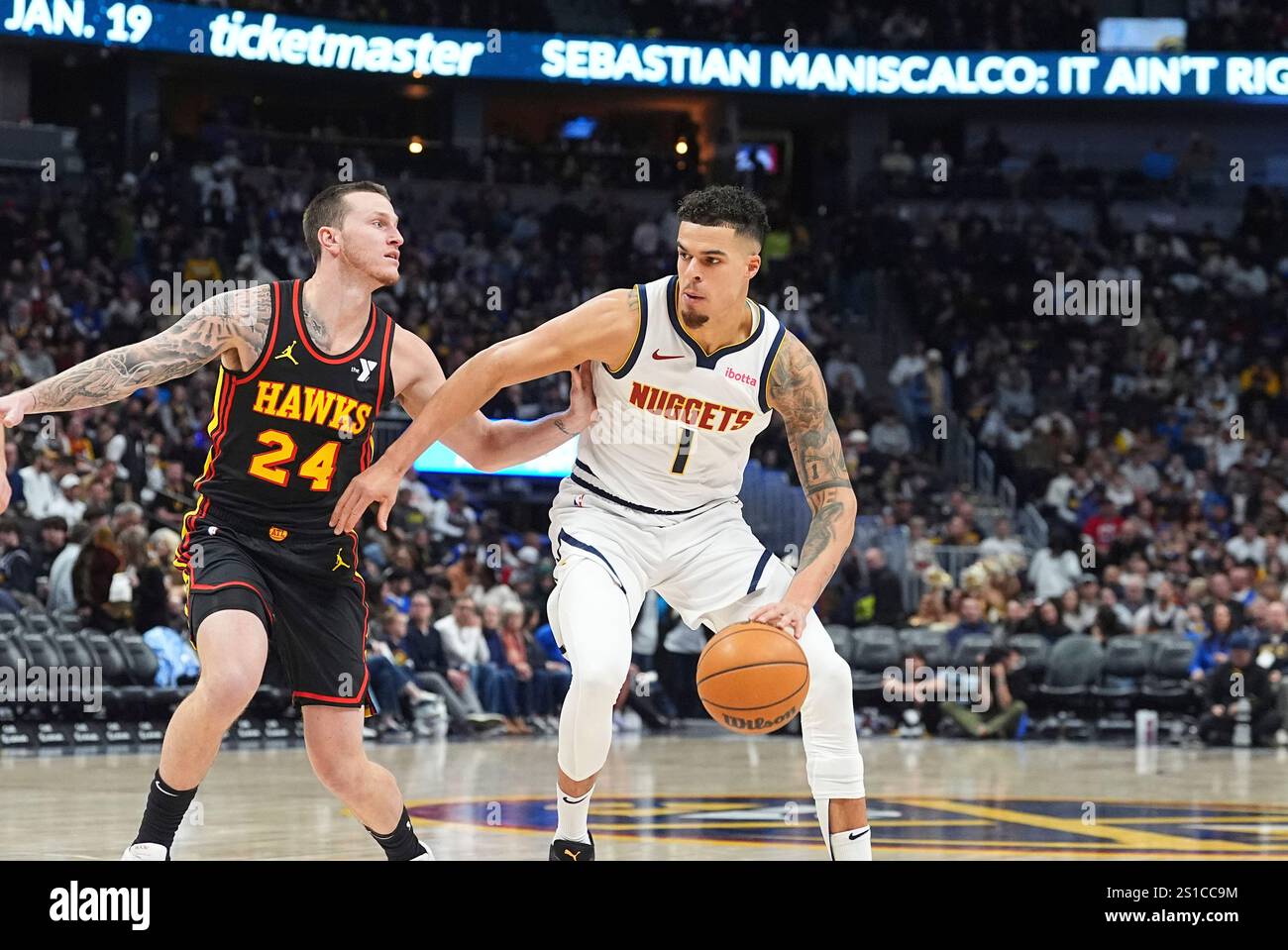 Atlanta Hawks guard Garrison Mathews (24) and Denver Nuggets forward ...