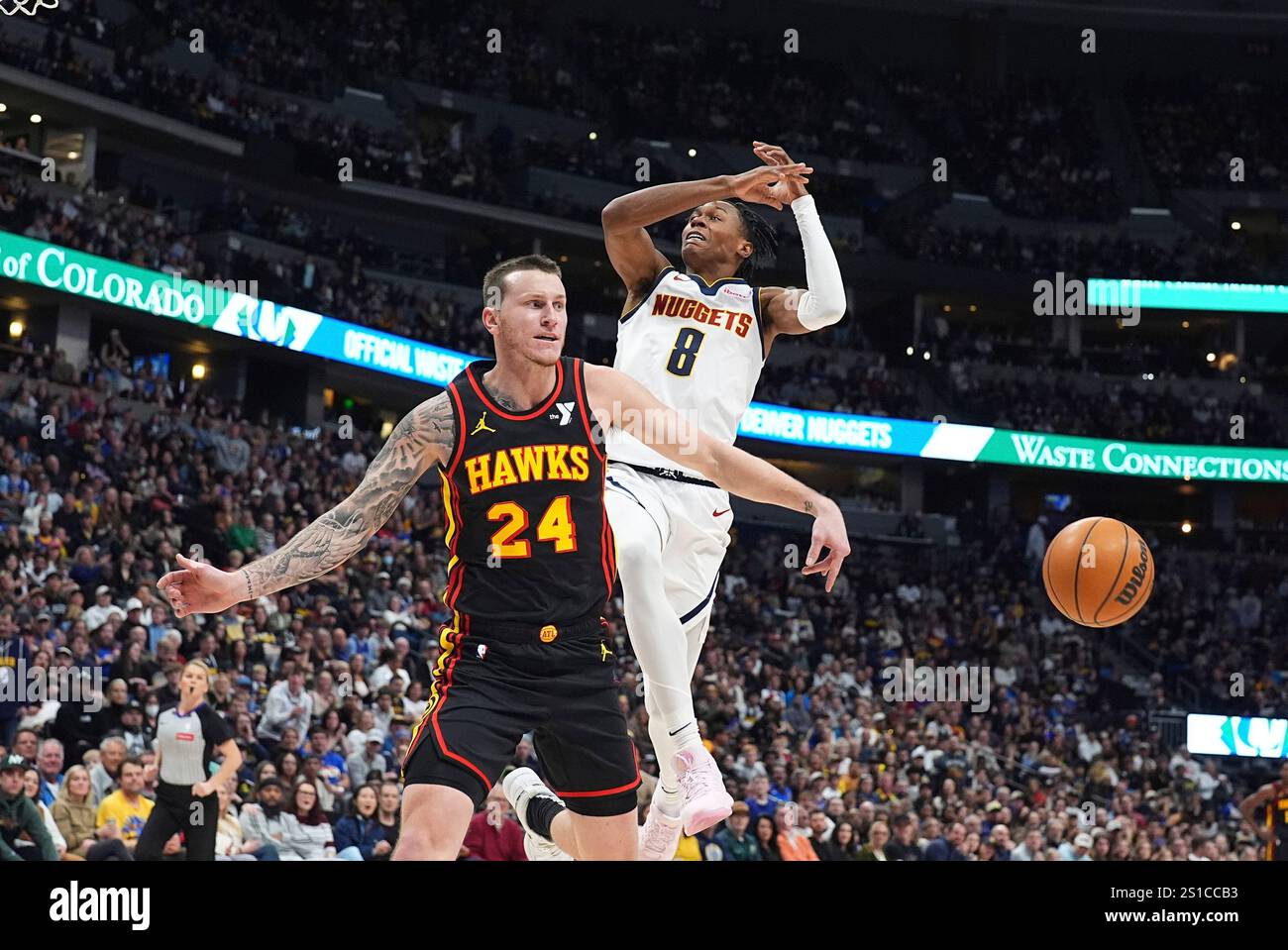 Atlanta Hawks guard Garrison Mathews (24) and Denver Nuggets forward ...