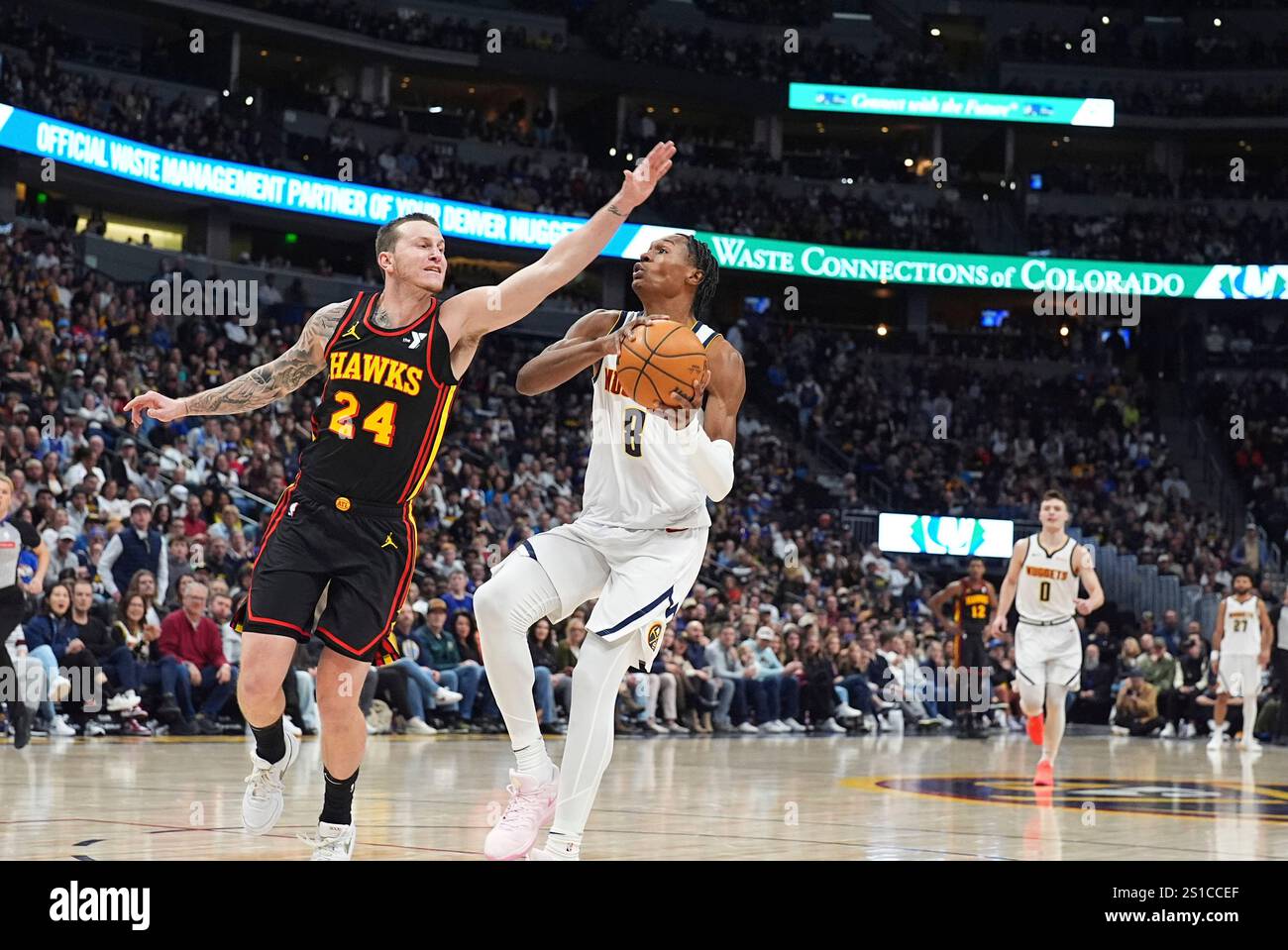 Atlanta Hawks guard Garrison Mathews (24) and Denver Nuggets forward ...