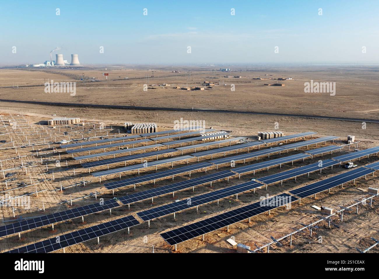 LINGWU, CHINA - JANUARY 2, 2025 - Workers install photovoltaic modules ...