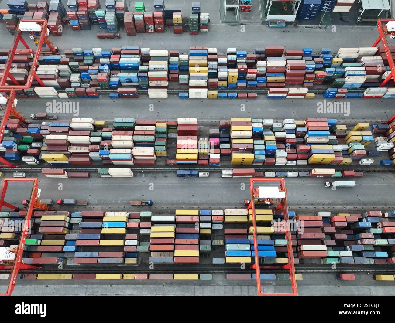 WUHU, CHINA - JANUARY 1, 2025 - Containers are loaded and unloaded at ...
