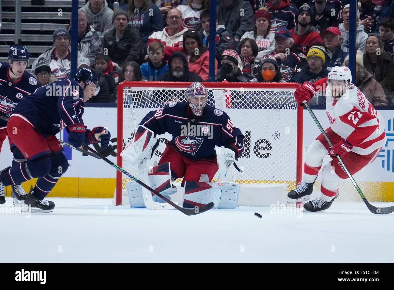 Columbus Blue Jackets defenseman Jack Johnson (3) and Detroit Red Wings ...