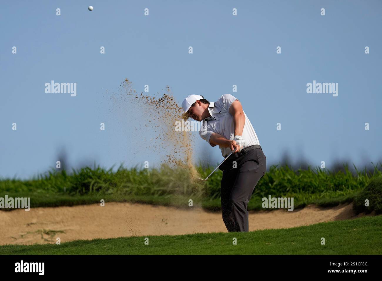 Davis Thompson hits from the bunker on the 12th fairway during the ...