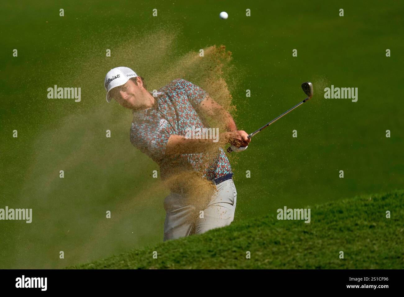 Davis Riley hits from the bunker on the 12th fairway during the first ...