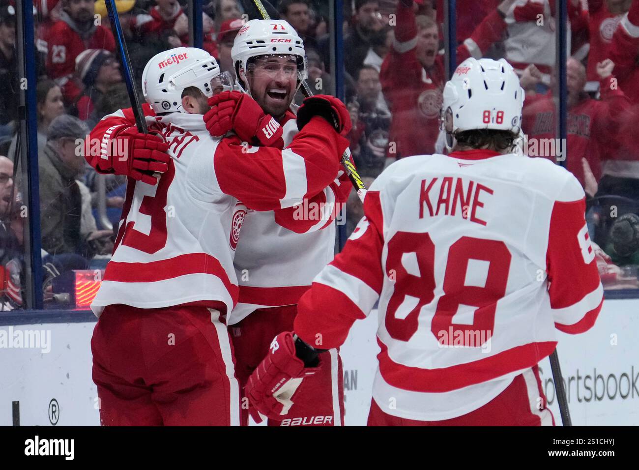 Detroit Red Wings center Dylan Larkin, center, celebrates his goal with ...