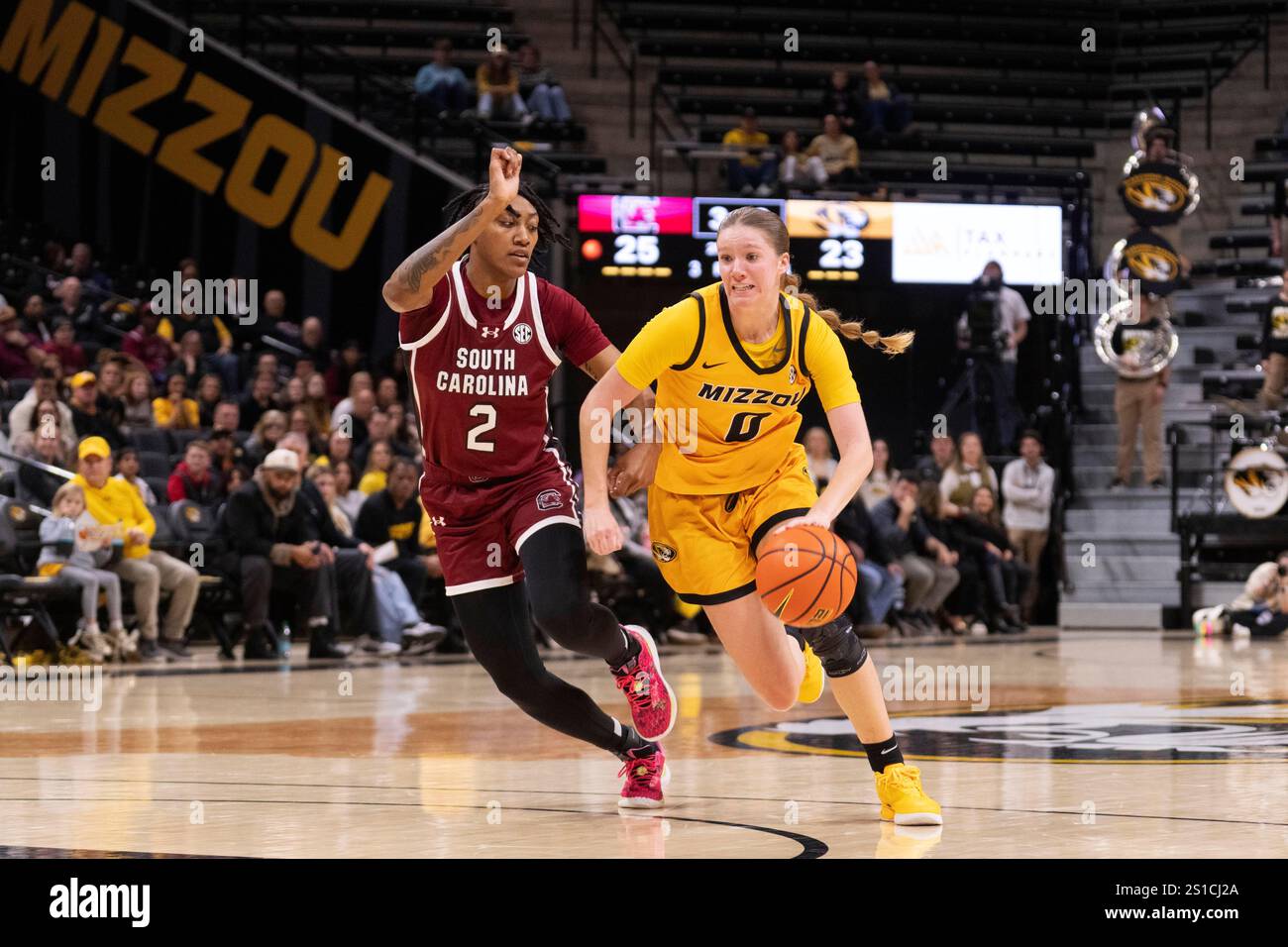 Missouri's Grace Slaughter, right, drives past South Carolina's Ashlyn ...