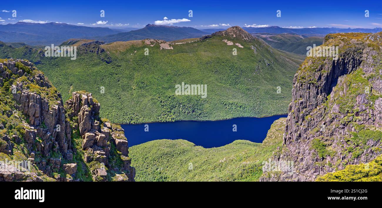 High view of blue glacial Lake Judd and dolerite cliffs and Mount Sarah ...
