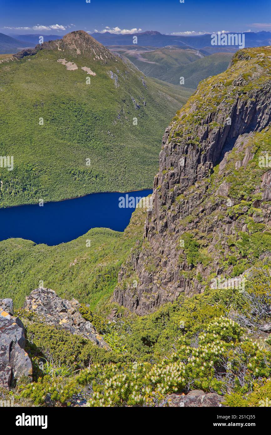 High view of blue glacial Lake Judd and dolerite cliffs and Mount Sarah ...