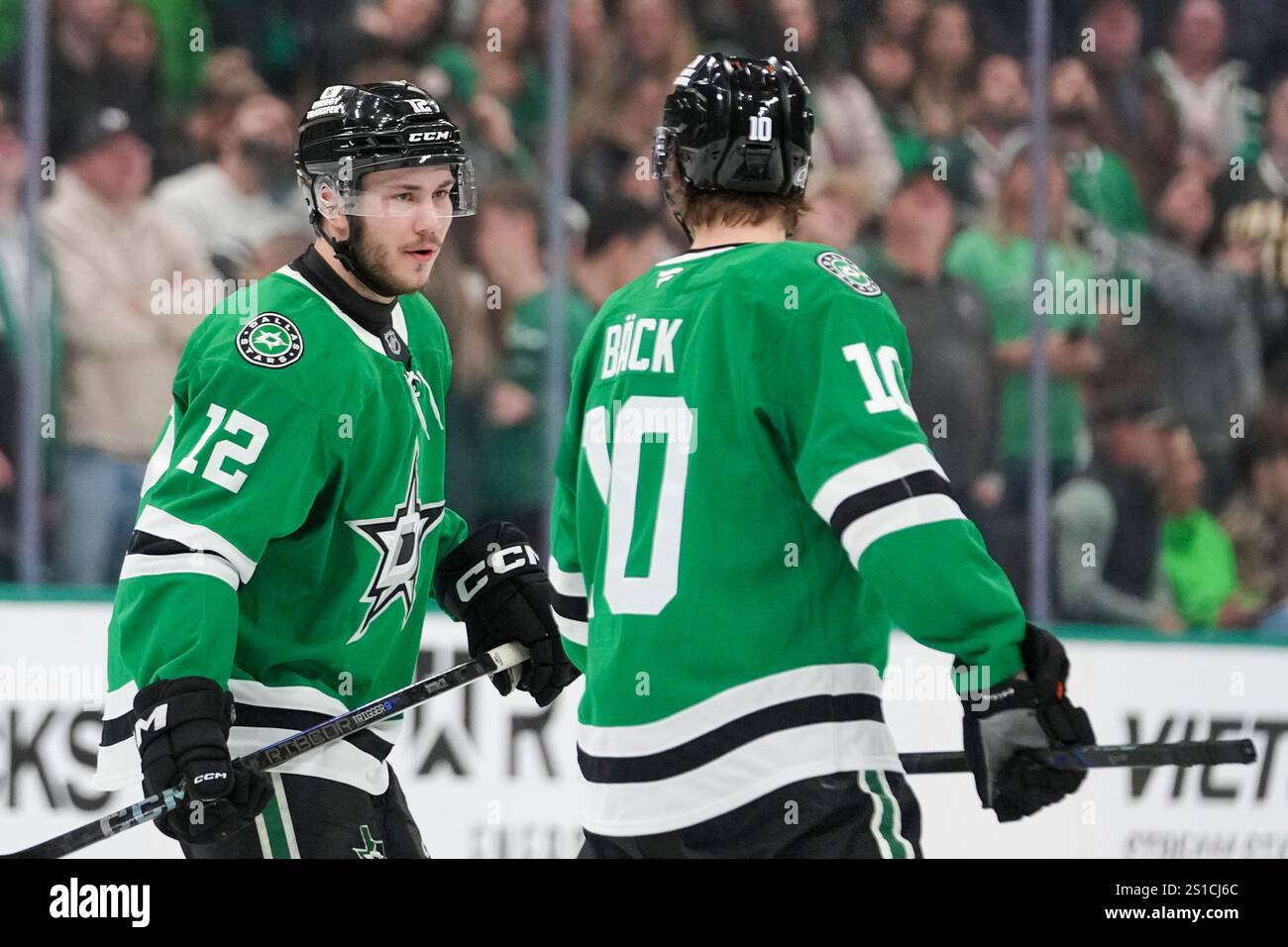 Dallas Stars right win Arttu Hyry, left, talks with center Oskar Back ...