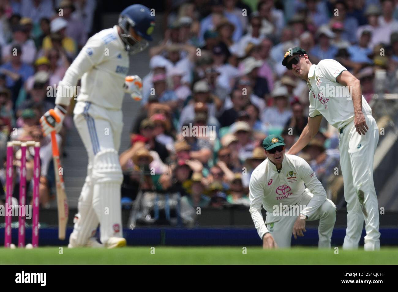 Australia's Steve Smith is consoled by teammate Beau Webster, right ...