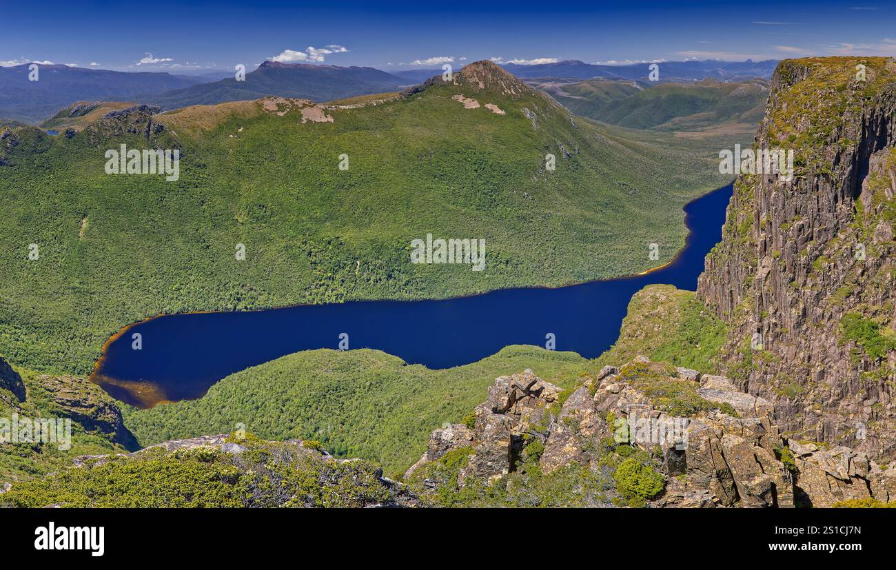 High view of blue glacial Lake Judd and dolerite cliffs and Mount Sarah ...
