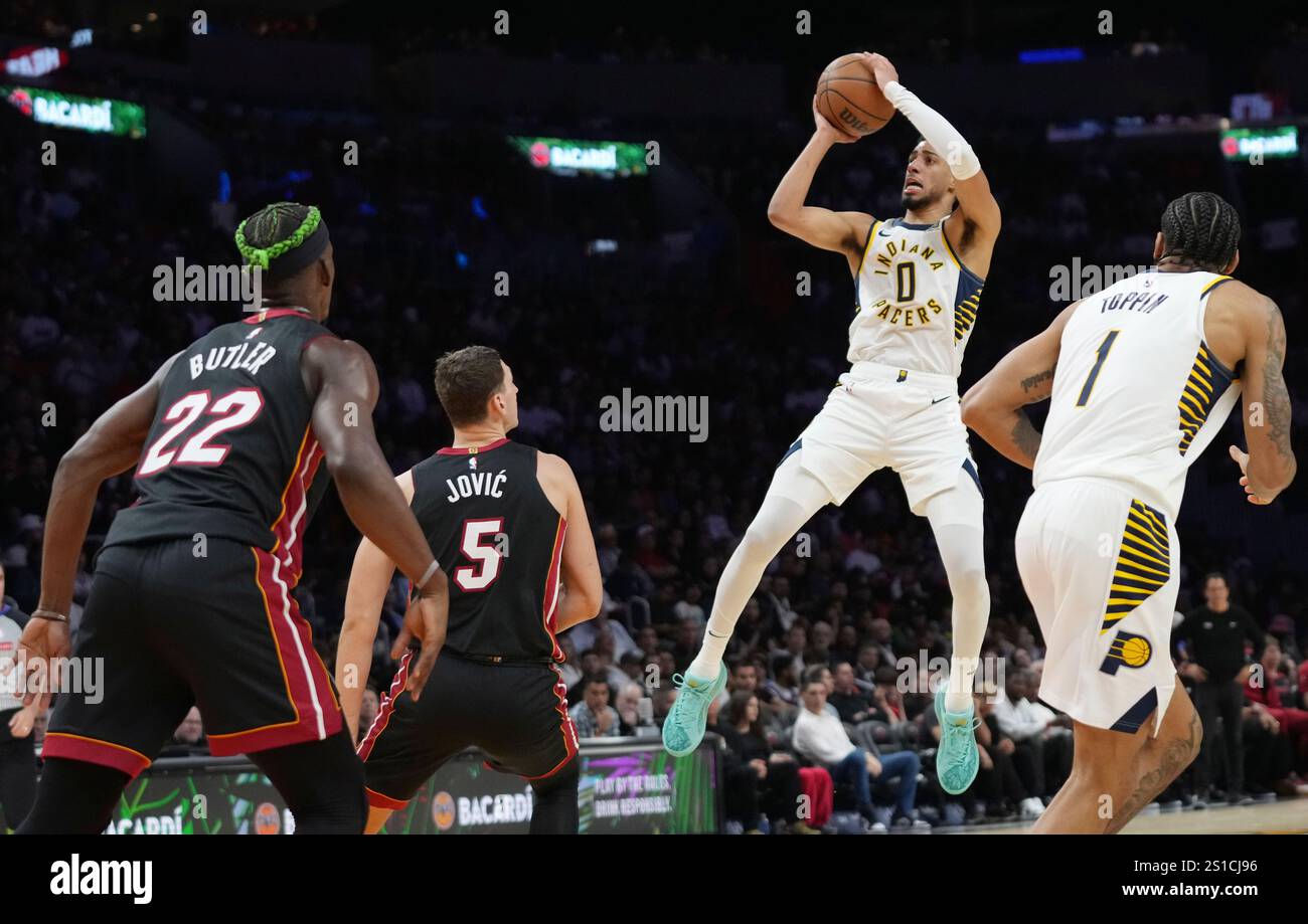 Indiana Pacers guard Tyrese Haliburton (0) shoots over Miami Heat ...