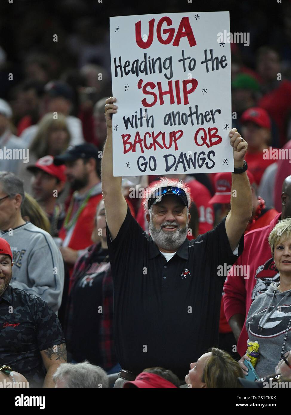NEW ORLEANS, LA - JANUARY 02: A Georgia Bulldogs fan holds a sign prior ...