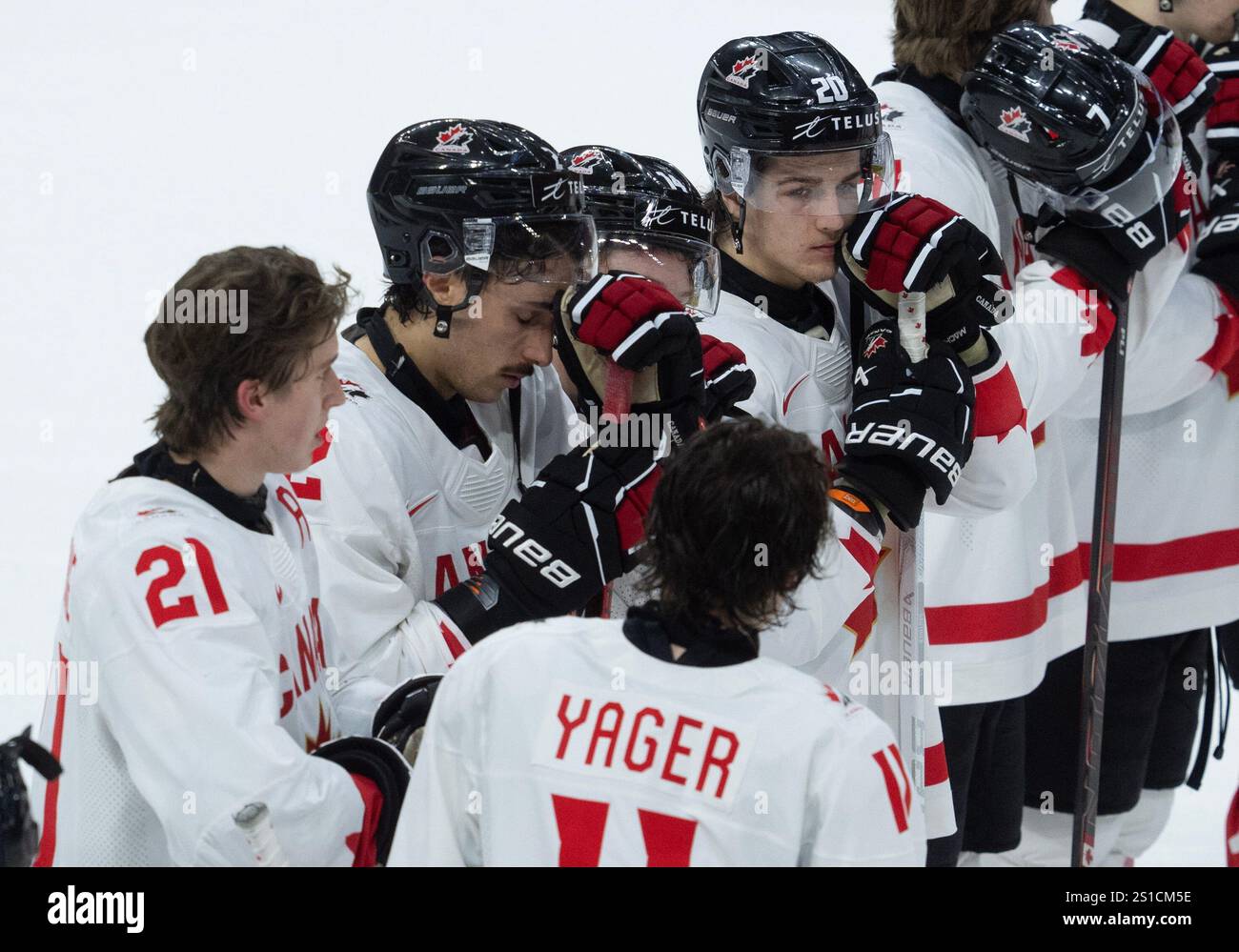 Canada defenceman Andrew Gibson (2) and teammates show their ...