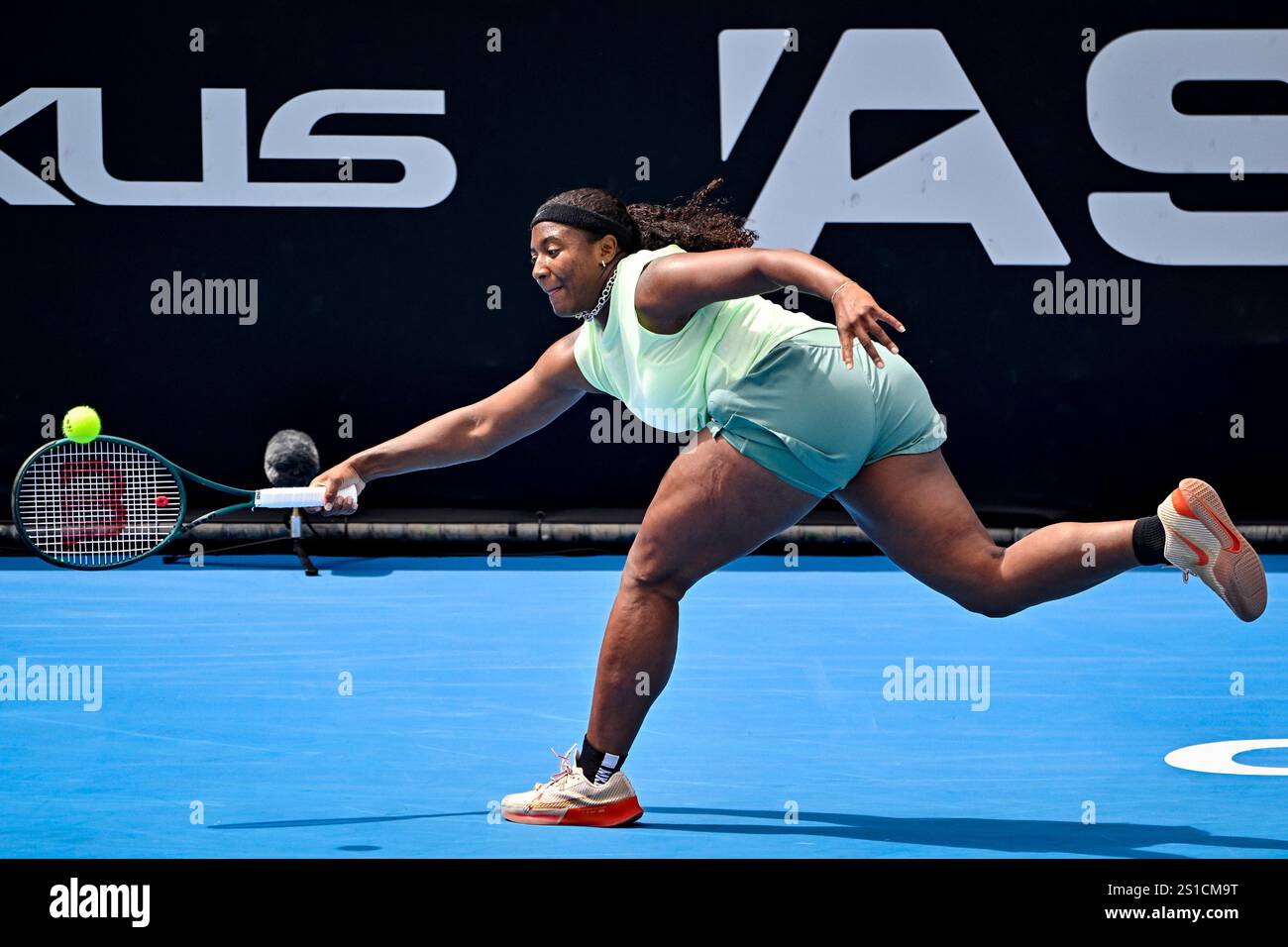 Hailey Baptiste of the U.S. plays a shot against Naomi Osaka of Japan in the quarterfinal match ...