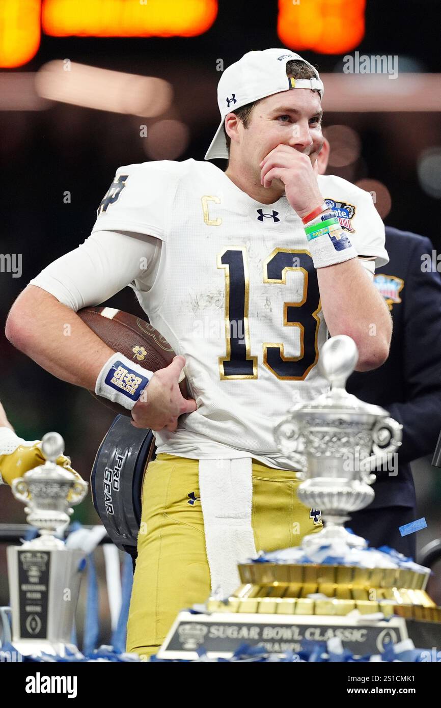 NEW ORLEANS, LA - JANUARY 02: Quarterback Riley Leonard #13 of the Notre Dame Fighting Irish is ...