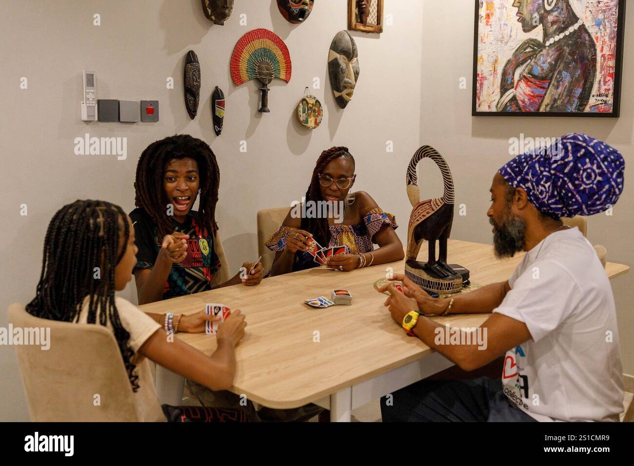 Keachia Bowers, second from right, her husband Damon Smith, right, and ...