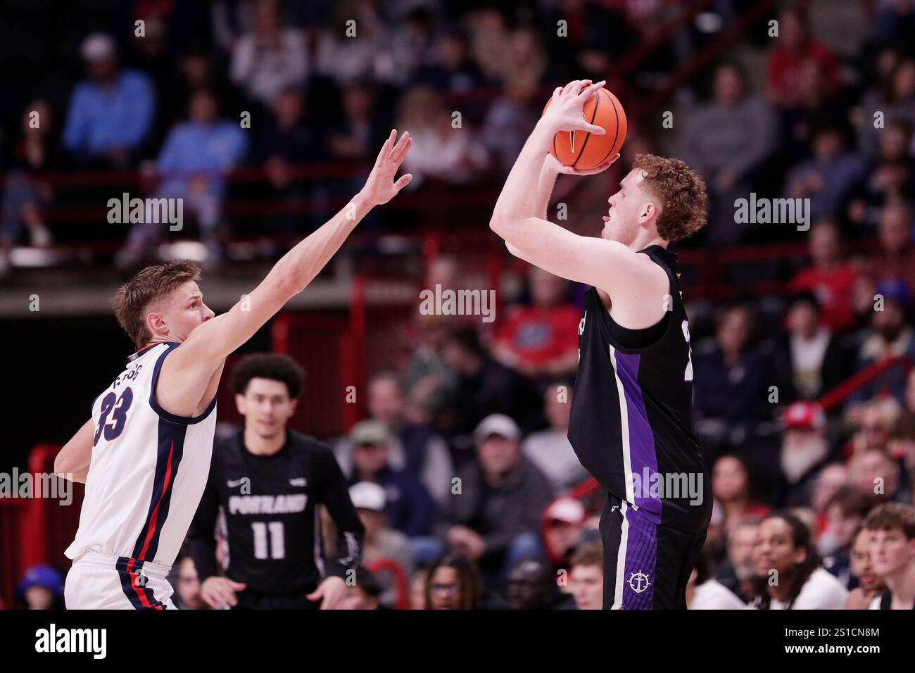 Portland forward Austin Rapp, right, shoots while pressured by Gonzaga ...