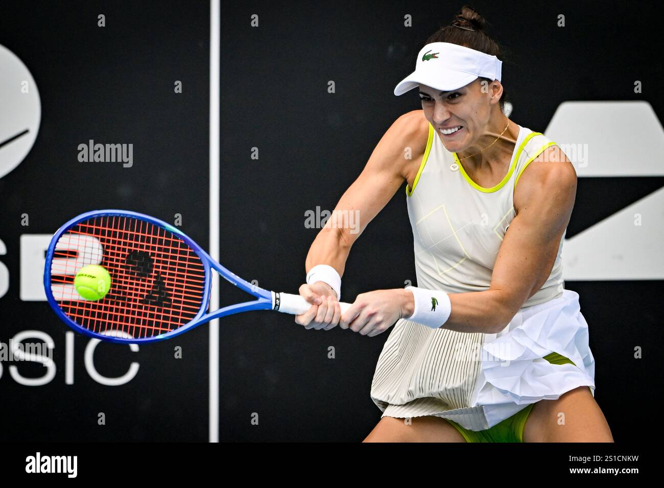 Bernarda Pera of the U.S. plays a shot against Robin Montgomery of the ...