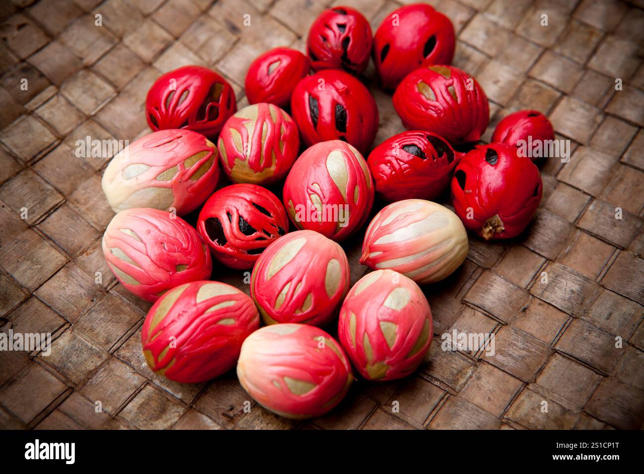 Assortment of organic mace aril and nutmeg seed. Mace is the spice made ...