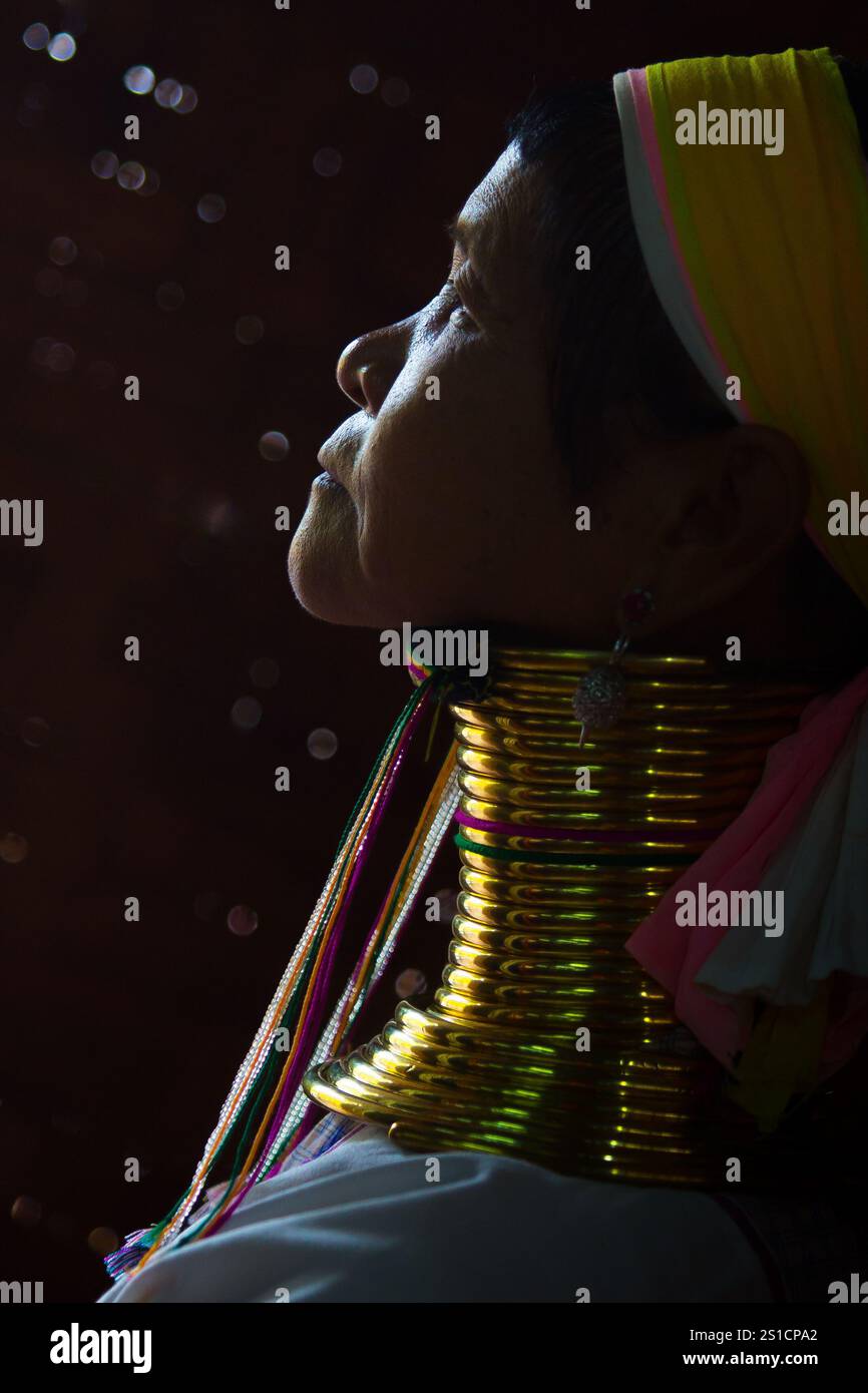 Low light portrait of an old Padaung "long neck" lady, Inle Lake ...