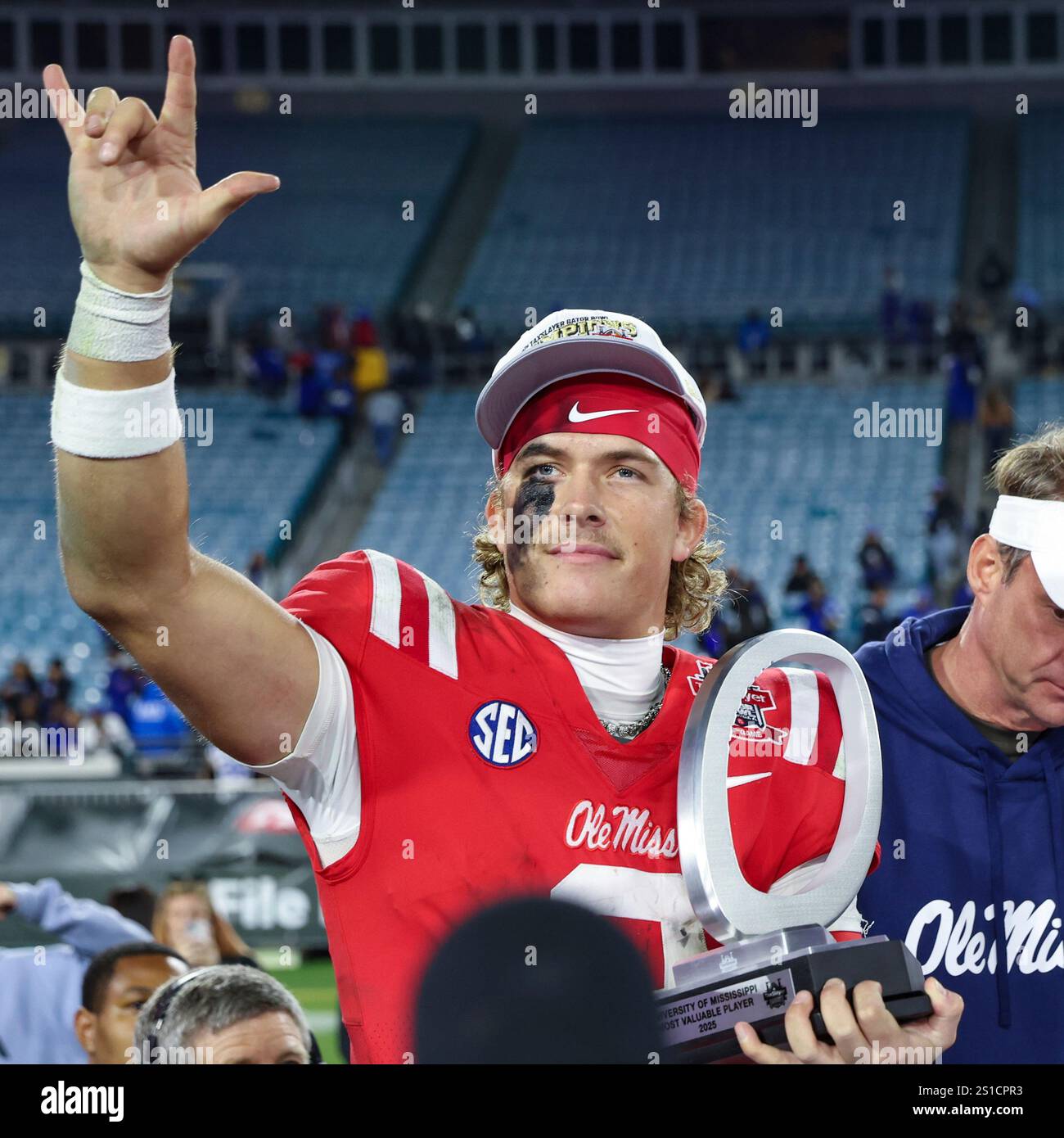 Mississippi quarterback Jaxson Dart waves to the stands after receiving the game's Most Valuable ...