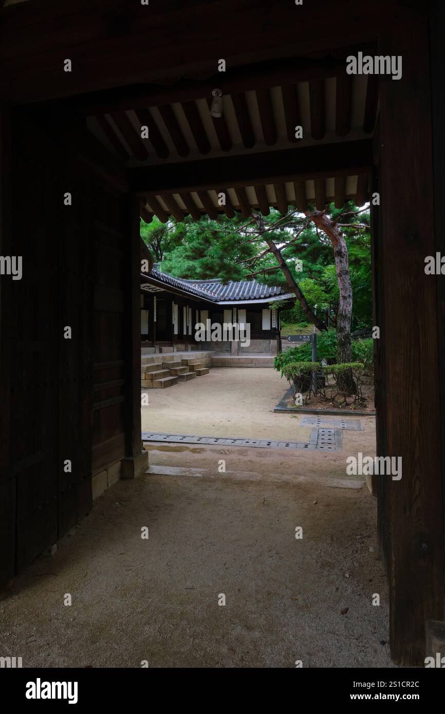 View of a wood gate with exposed beams. Exterior architecture view at ...