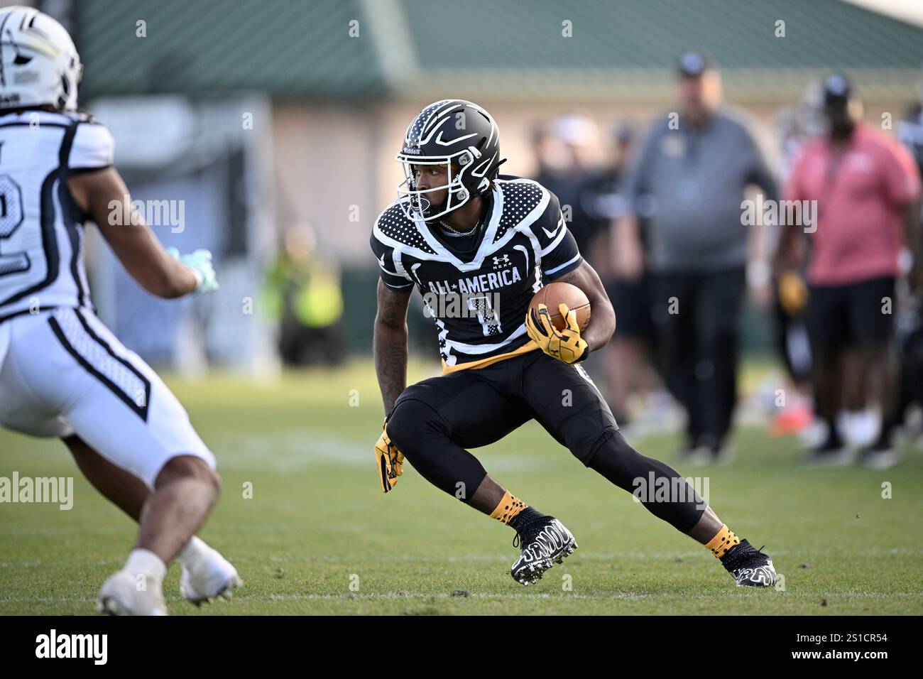Team Icon receiver Dakorien Moore (1) runs after catching a pass ...