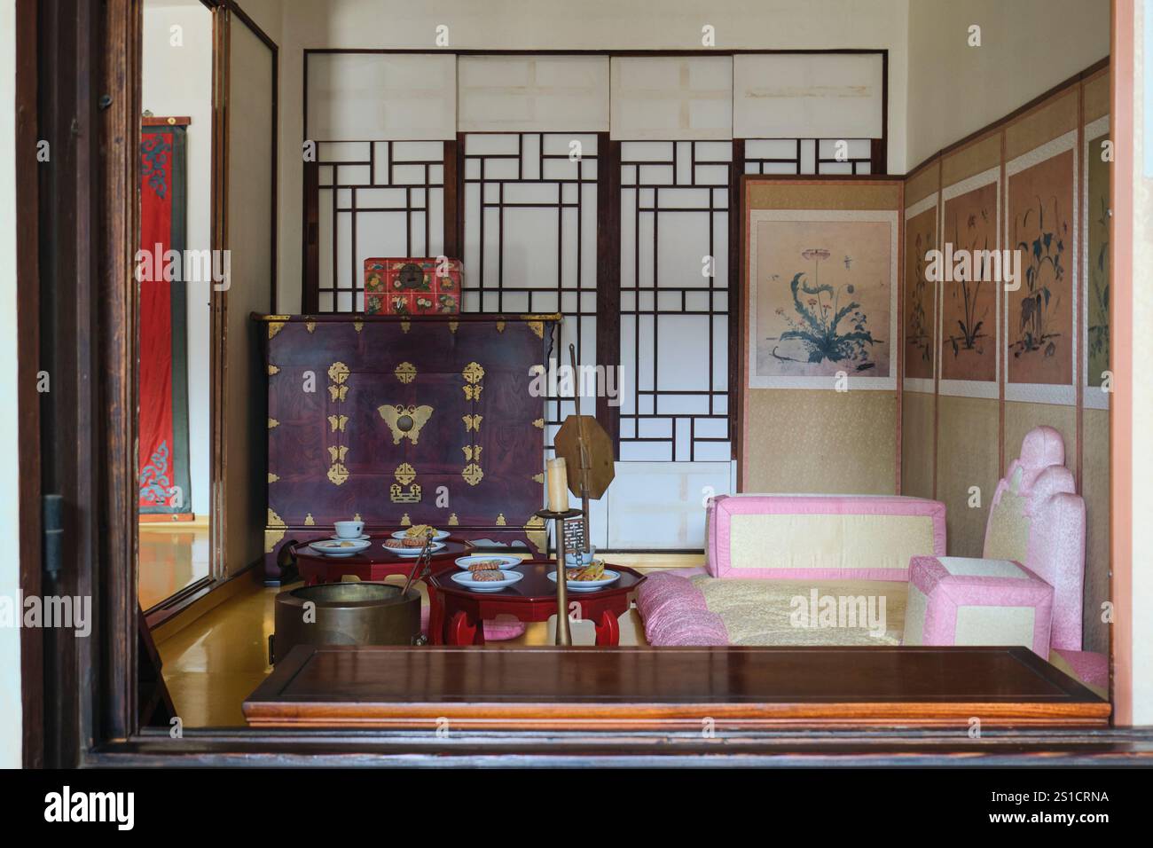 Royal room with wood chest, pink cushions, a tea meal set. Interior ...