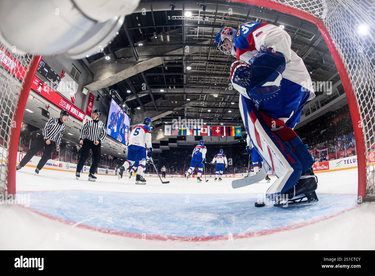 Goaltender Samuel Urban of, Slovakia. , . looks dejected after Rasmus ...