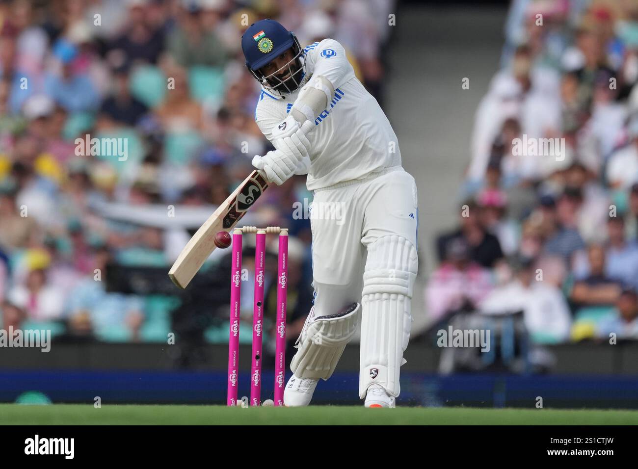 India's Jasprit Bumrah bats during play on the first day of the fifth ...