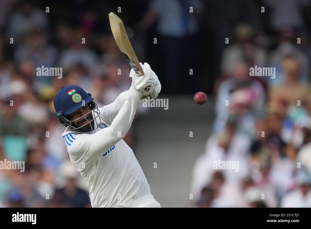 India's Jasprit Bumrah bats during play on the first day of the fifth ...