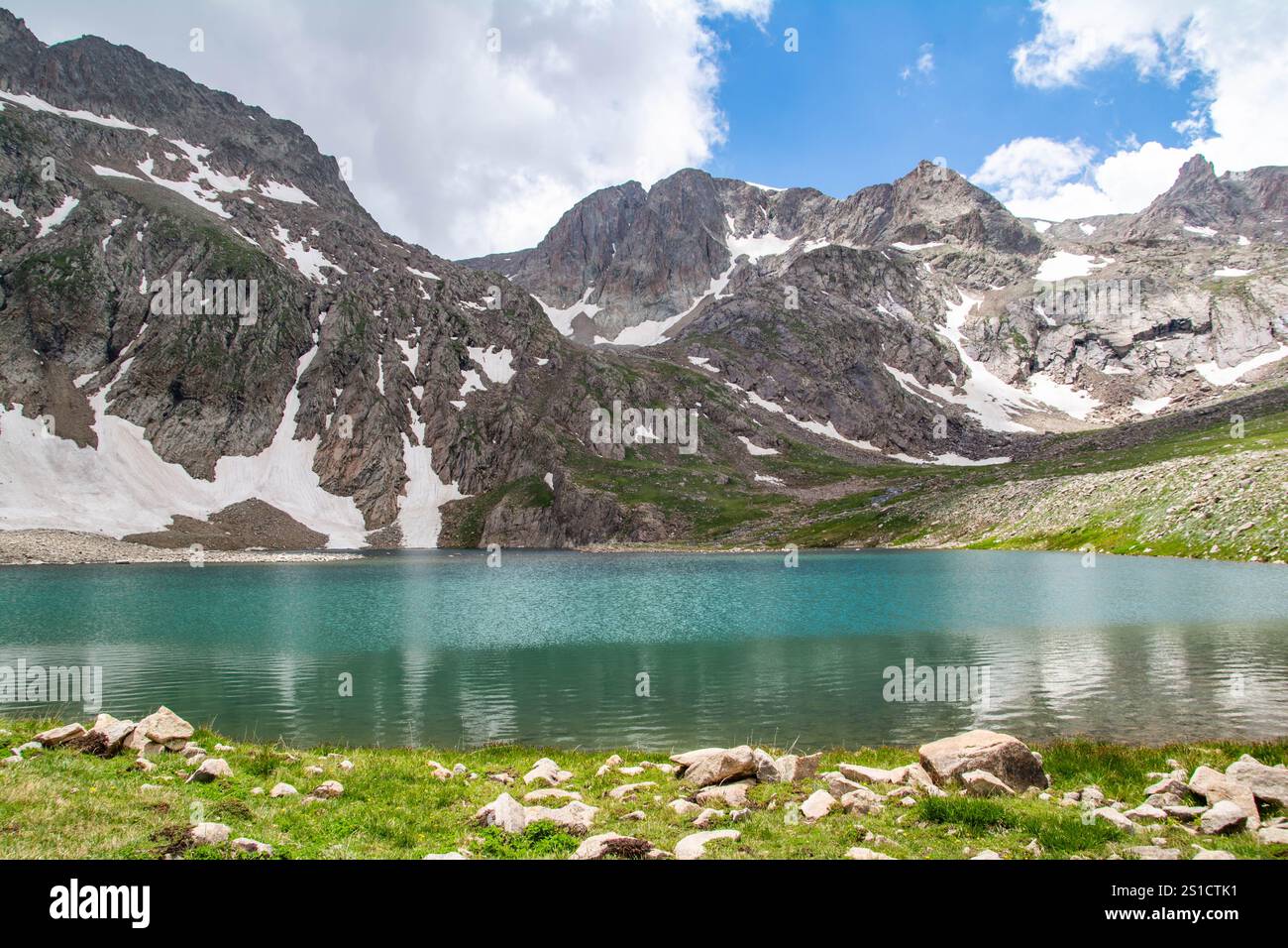 Mountain lake and rocky mountains. Crystal clear lake in the middle of ...