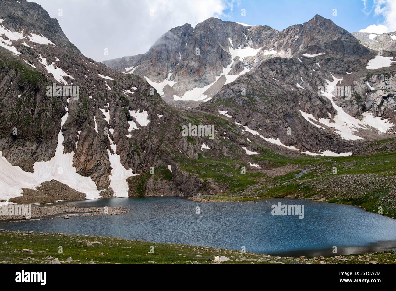 Mountain lake and rocky mountains. Crystal clear lake in the middle of ...
