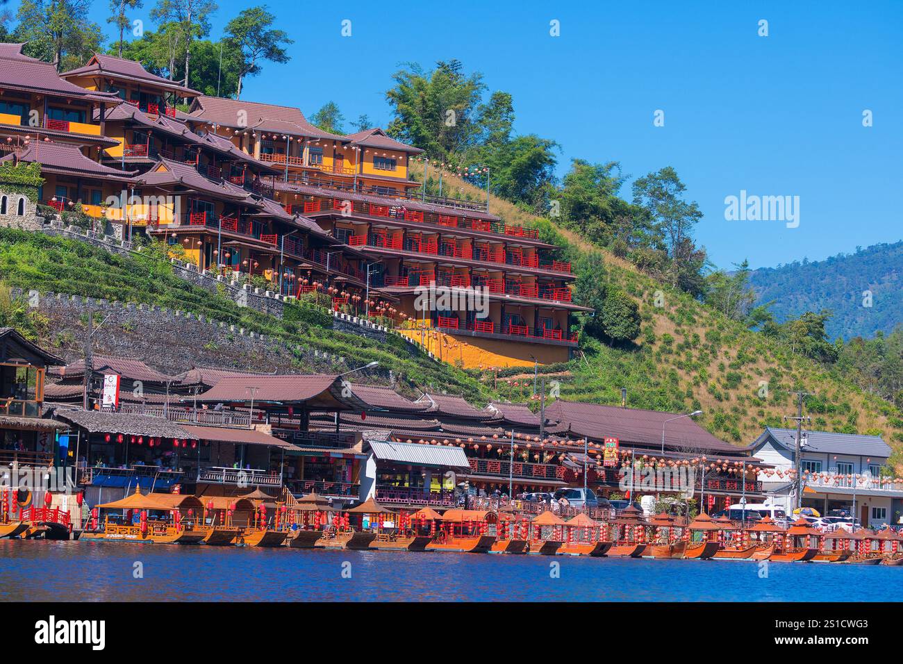 Chinese village of Ban Rak Thai with tea plantations and a lake ...