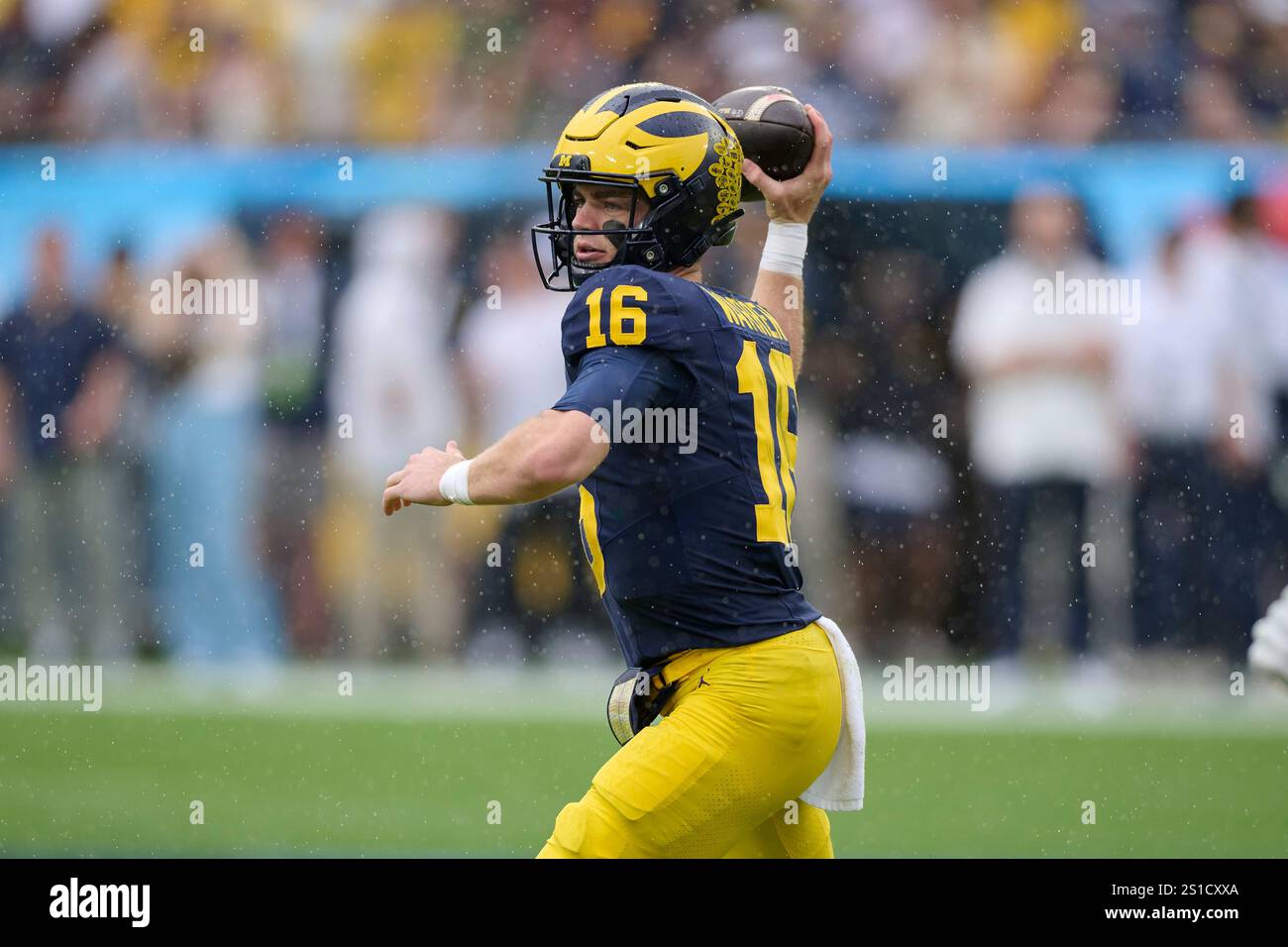 December 31, 2024: Michigan quarterback Davis Warren (16) passing ...