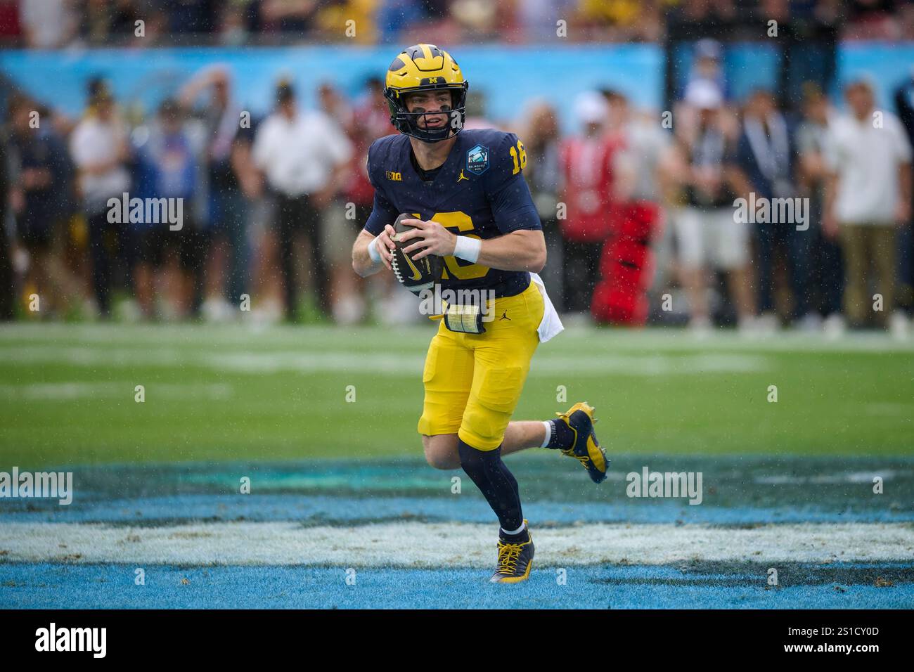 December 31, 2024: Michigan quarterback Davis Warren (16) looks to pass ...