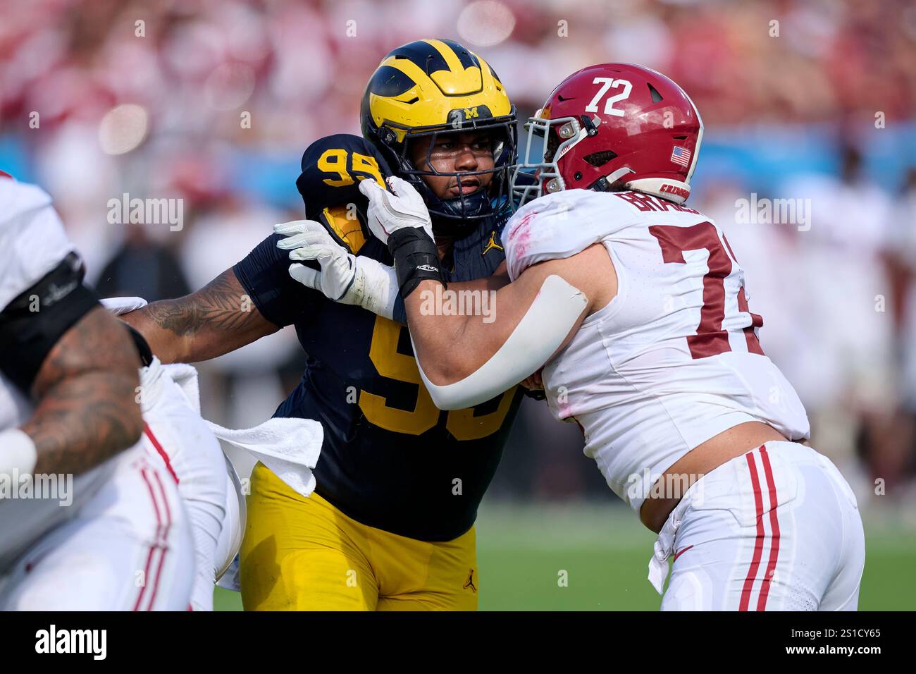 Tampa, Florida, USA. 31st Dec, 2024. Michigan defensive lineman Trey ...