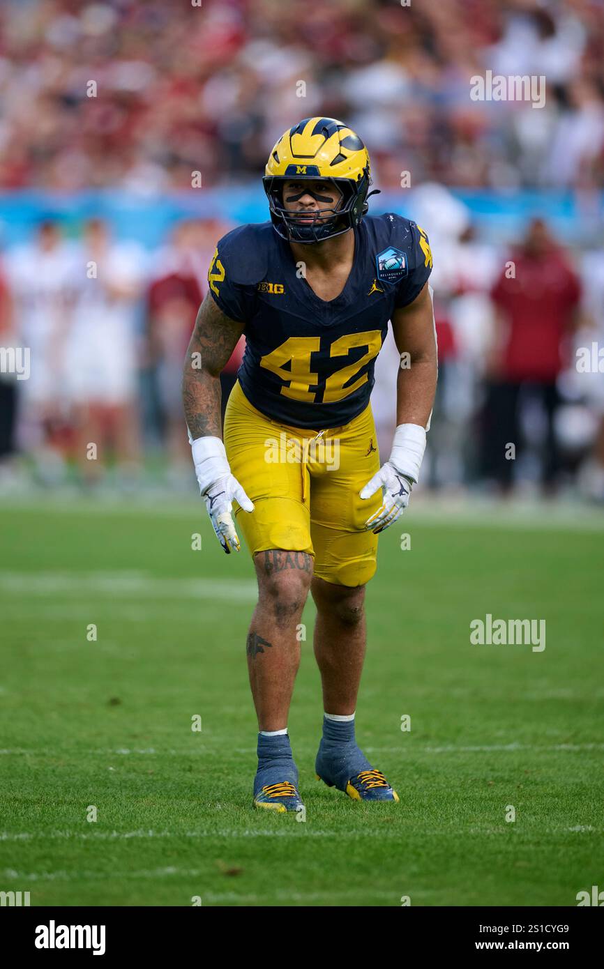 Tampa, Florida, USA. 31st Dec, 2024. Michigan defensive end TJ Guy (42 ...