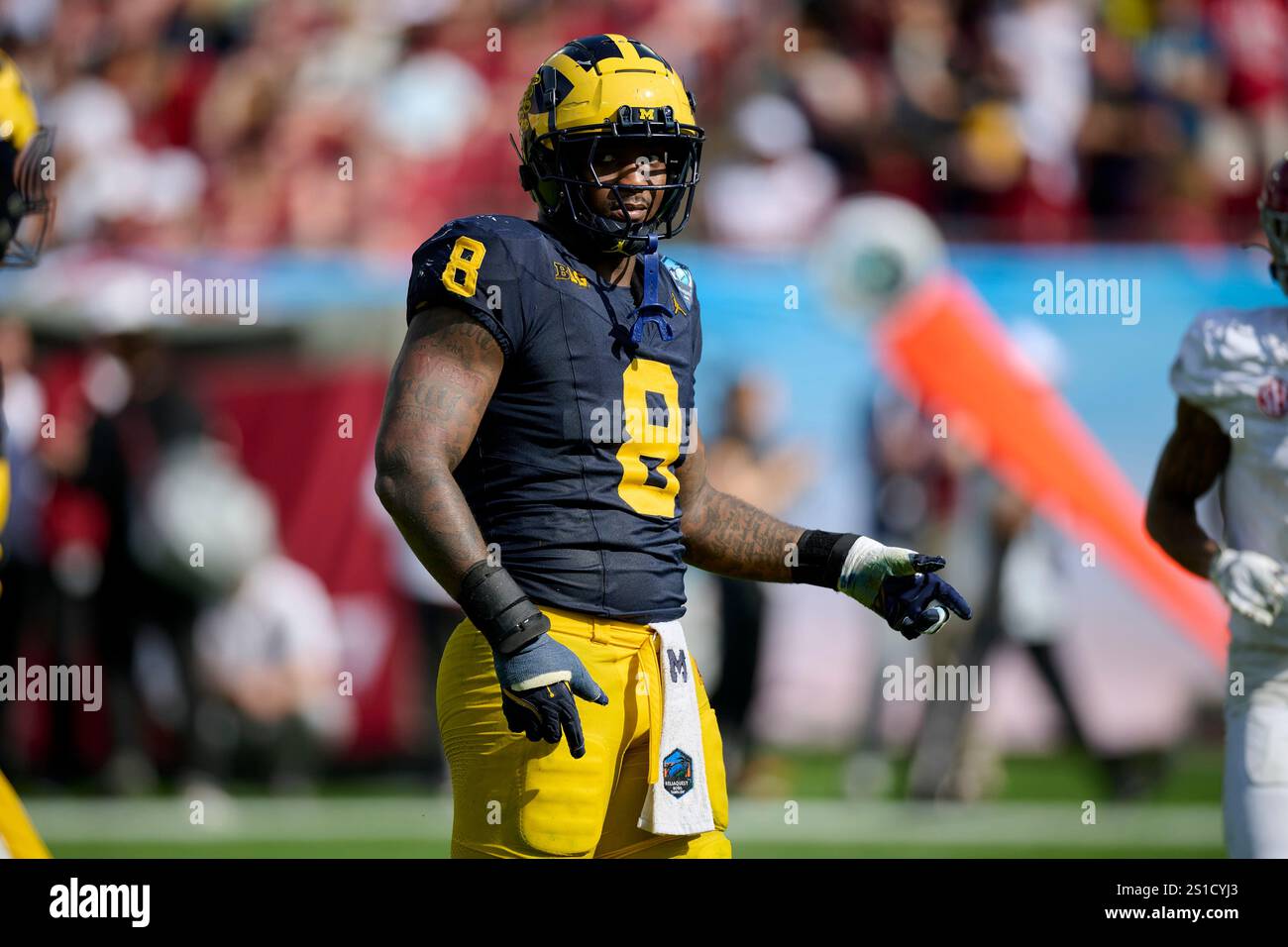 Tampa, Florida, USA. 31st Dec, 2024. Michigan defensive end Derrick ...