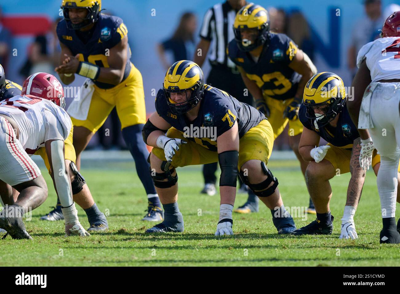 Tampa, Florida, USA. 31st Dec, 2024. Michigan offensive lineman Evan ...